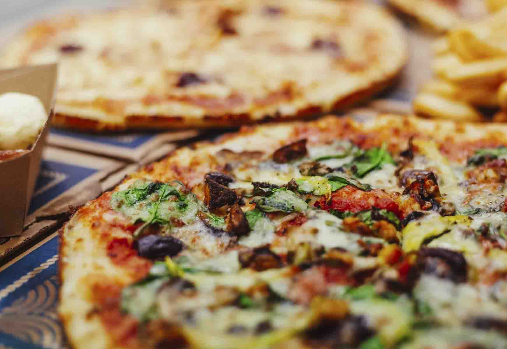 Get Neptunes Pizzeria delivered to your door with Delivereasy