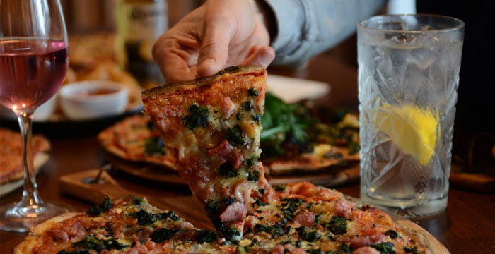 Get The Pizza Library Co. delivered to your door with Delivereasy